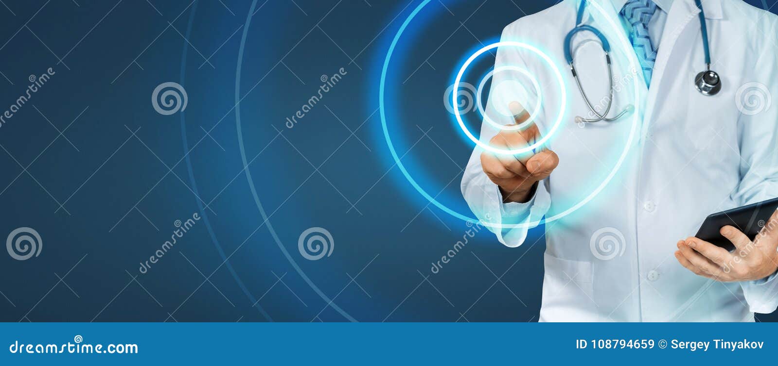 Doctor with Tablet Pointing Screen on Blue Background. Modern ...