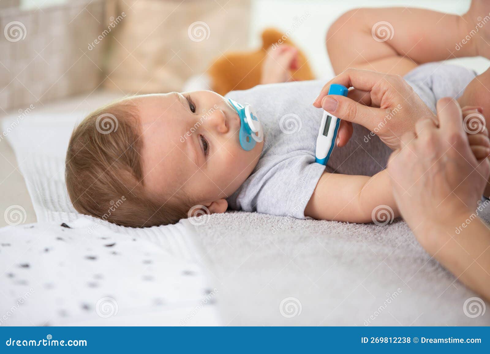 Doctor Taking Babys Temperature Stock Photo - Image of childhood, child ...
