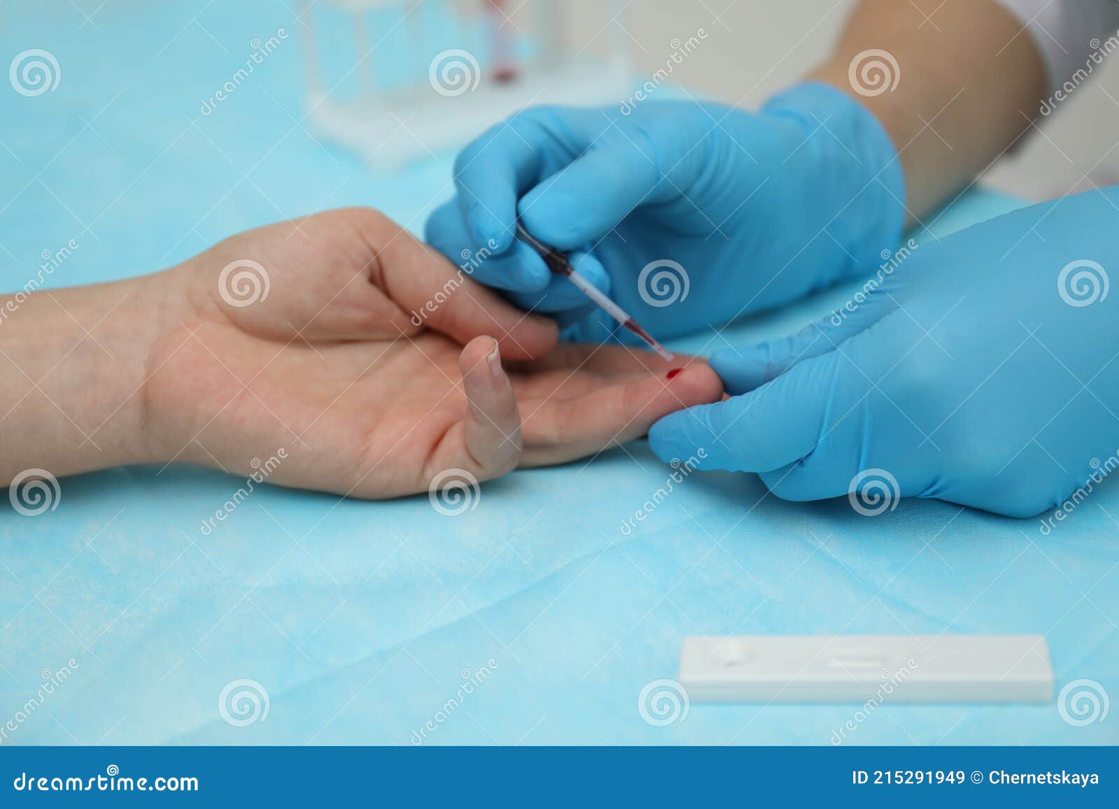 Doctor Taking Blood Sample from Patient`s Finger at Table, Closeup ...