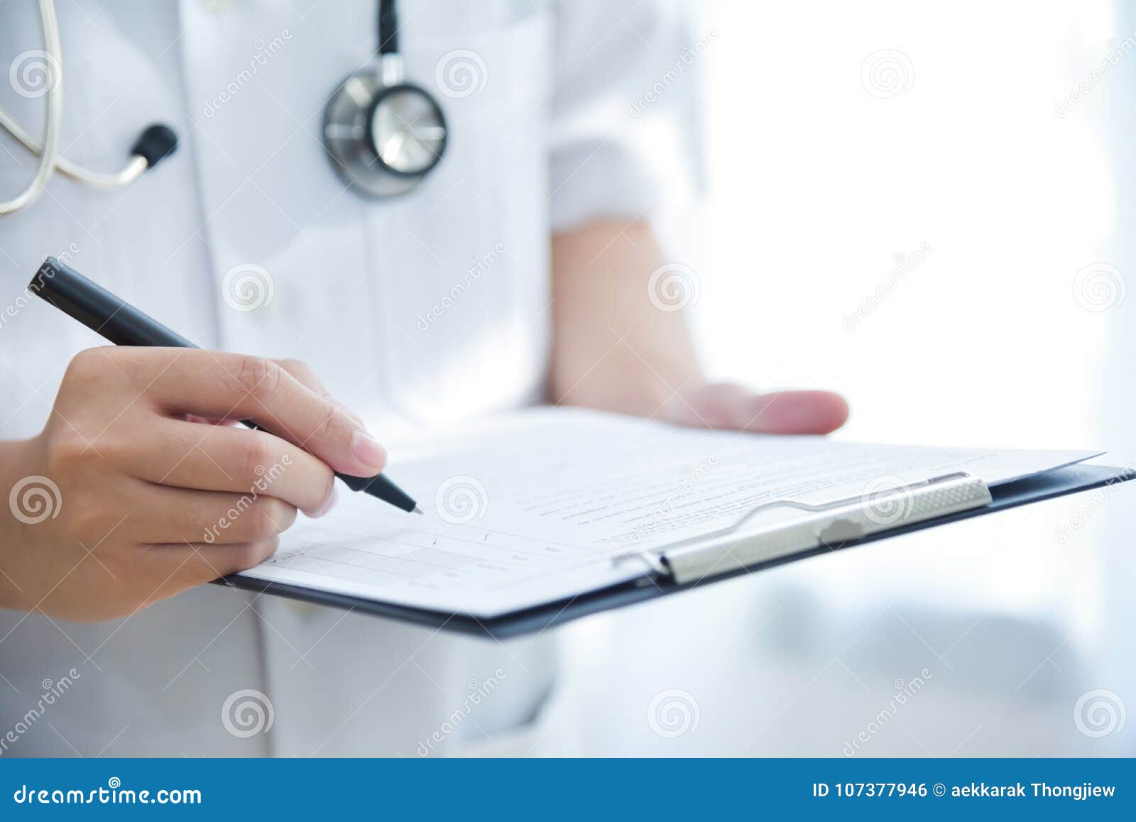 Doctor Taking Note on Checklist Paper. Stock Photo - Image of ...
