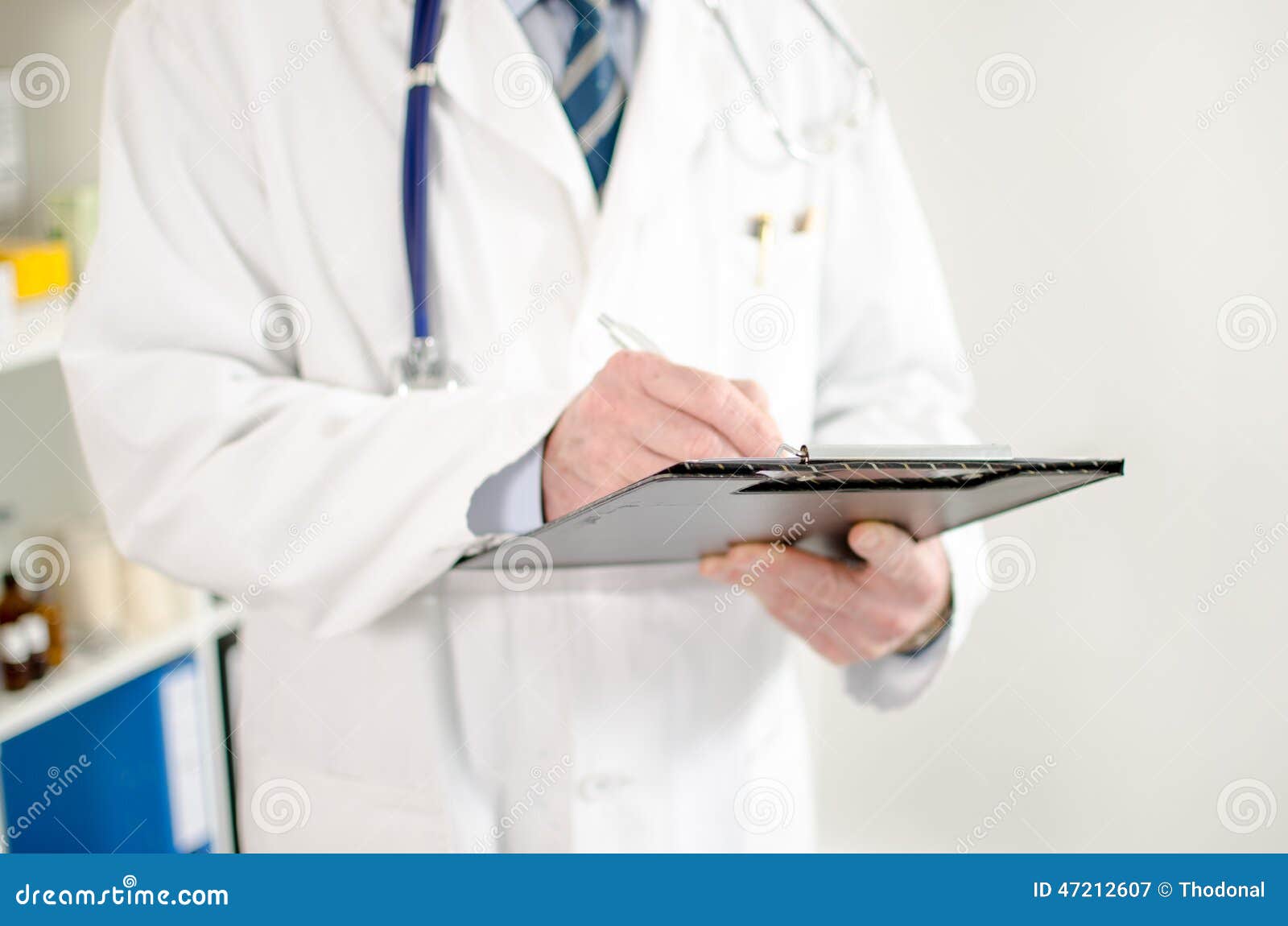 Doctor taking notes stock image. Image of person, notes - 47212607