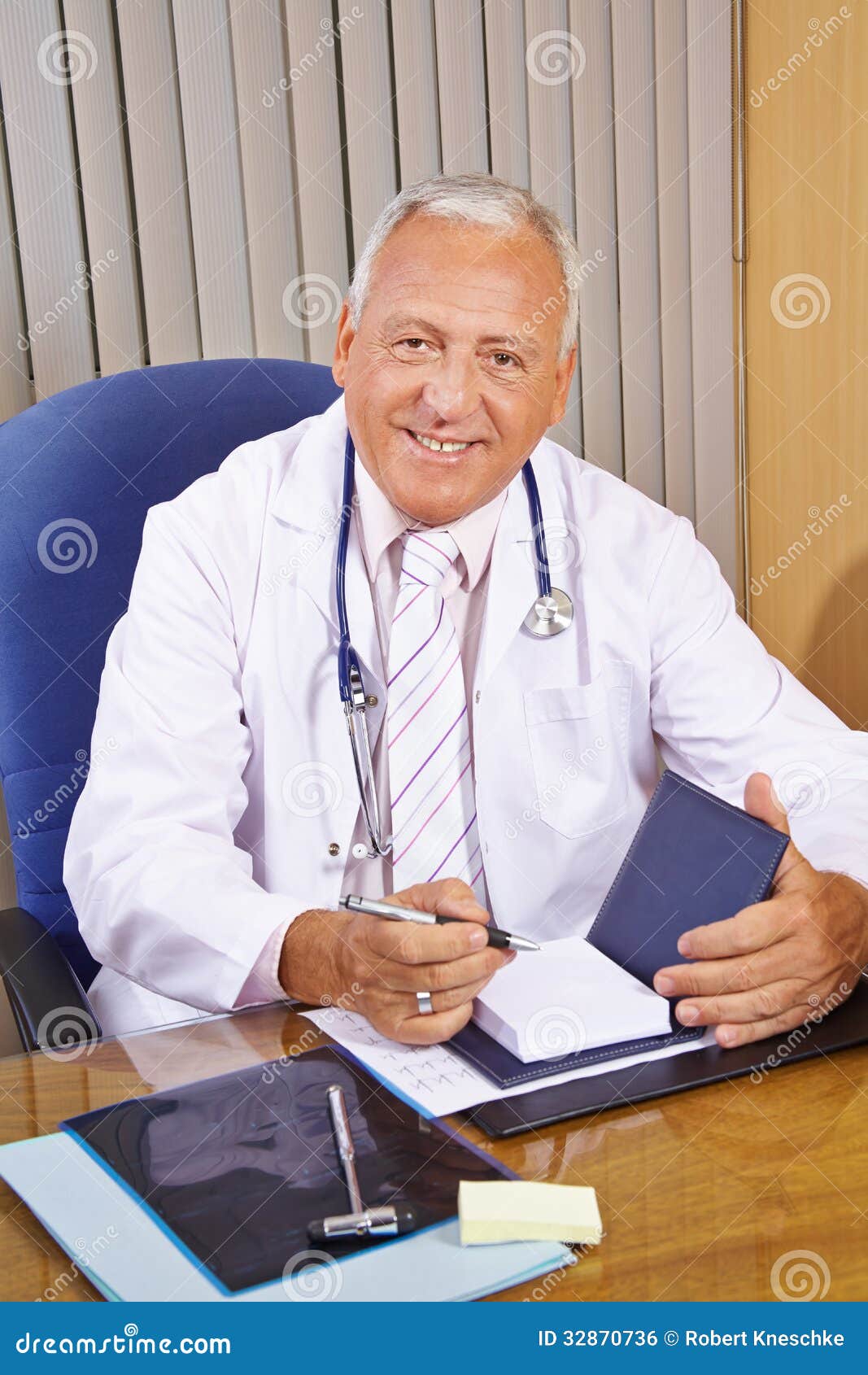 Doctor Taking Notes in His Office Stock Photo - Image of notepad ...