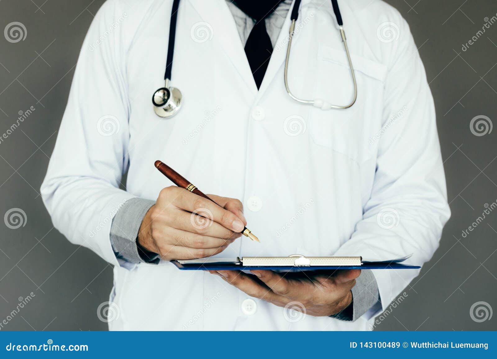 The Doctor is Taking Notes in the Hospital Stock Image - Image of exam ...