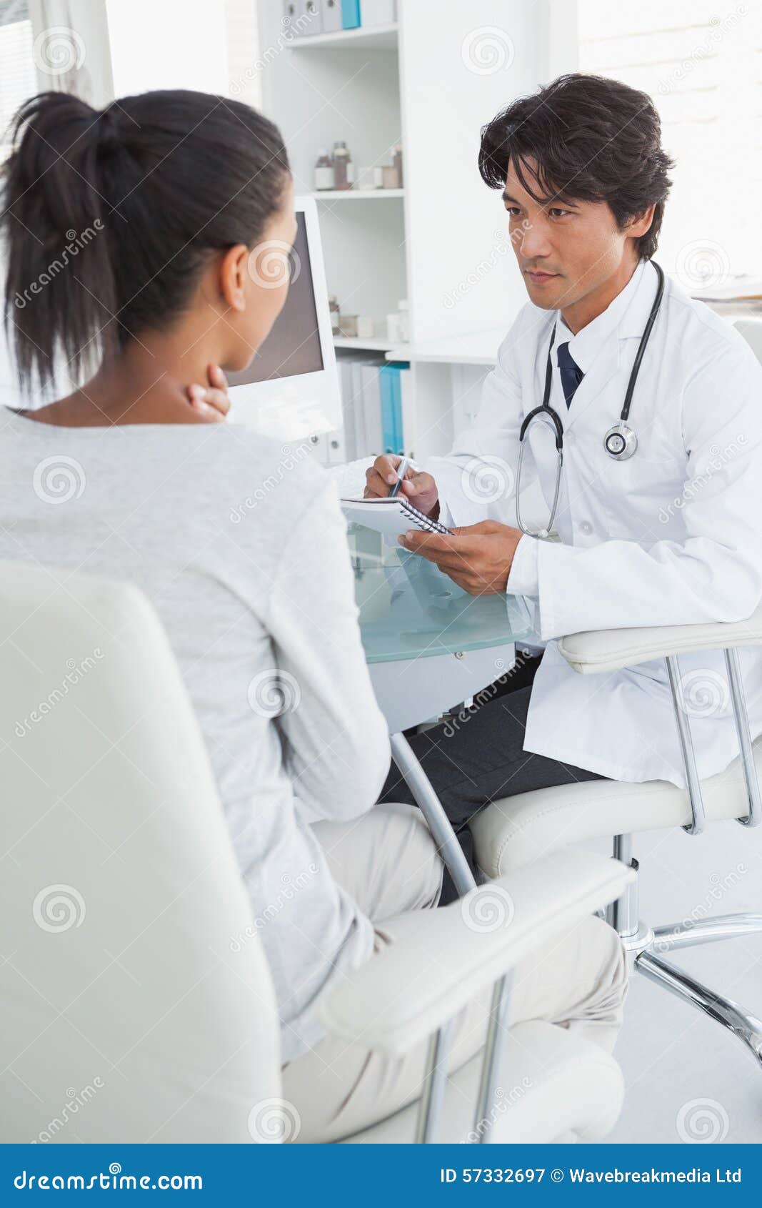 Doctor Taking Notes from Patient Stock Image - Image of patient ...