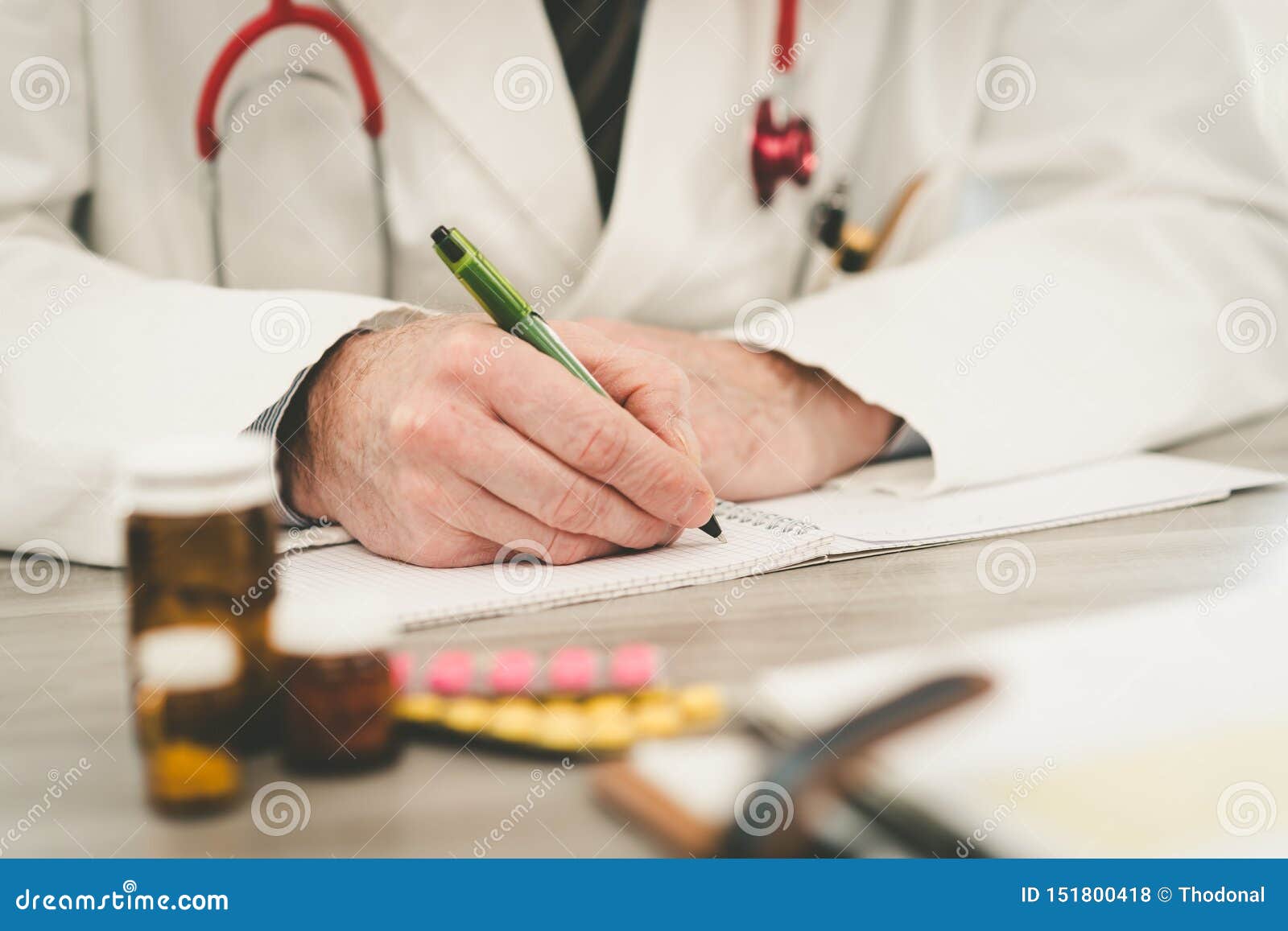 Doctor taking notes stock photo. Image of practitioner - 151800418