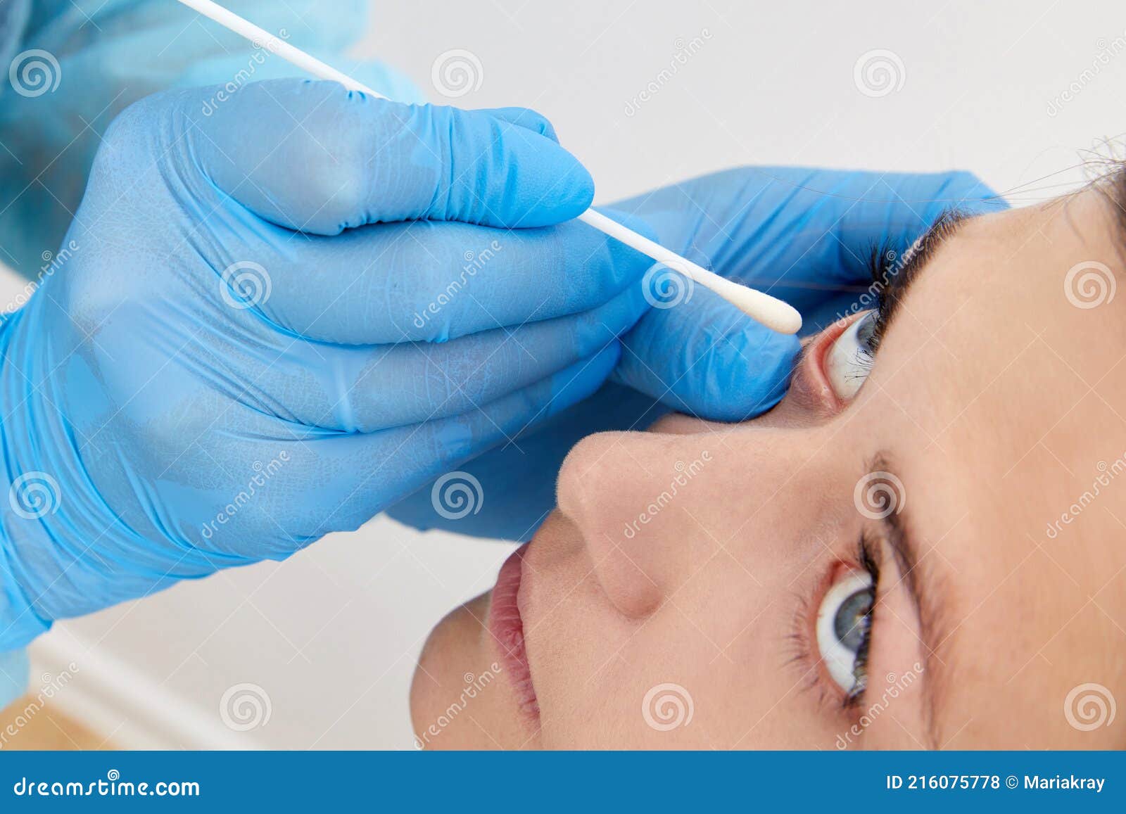 Doctor Taking Sample with Swab from the Eye Stock Photo - Image of ...