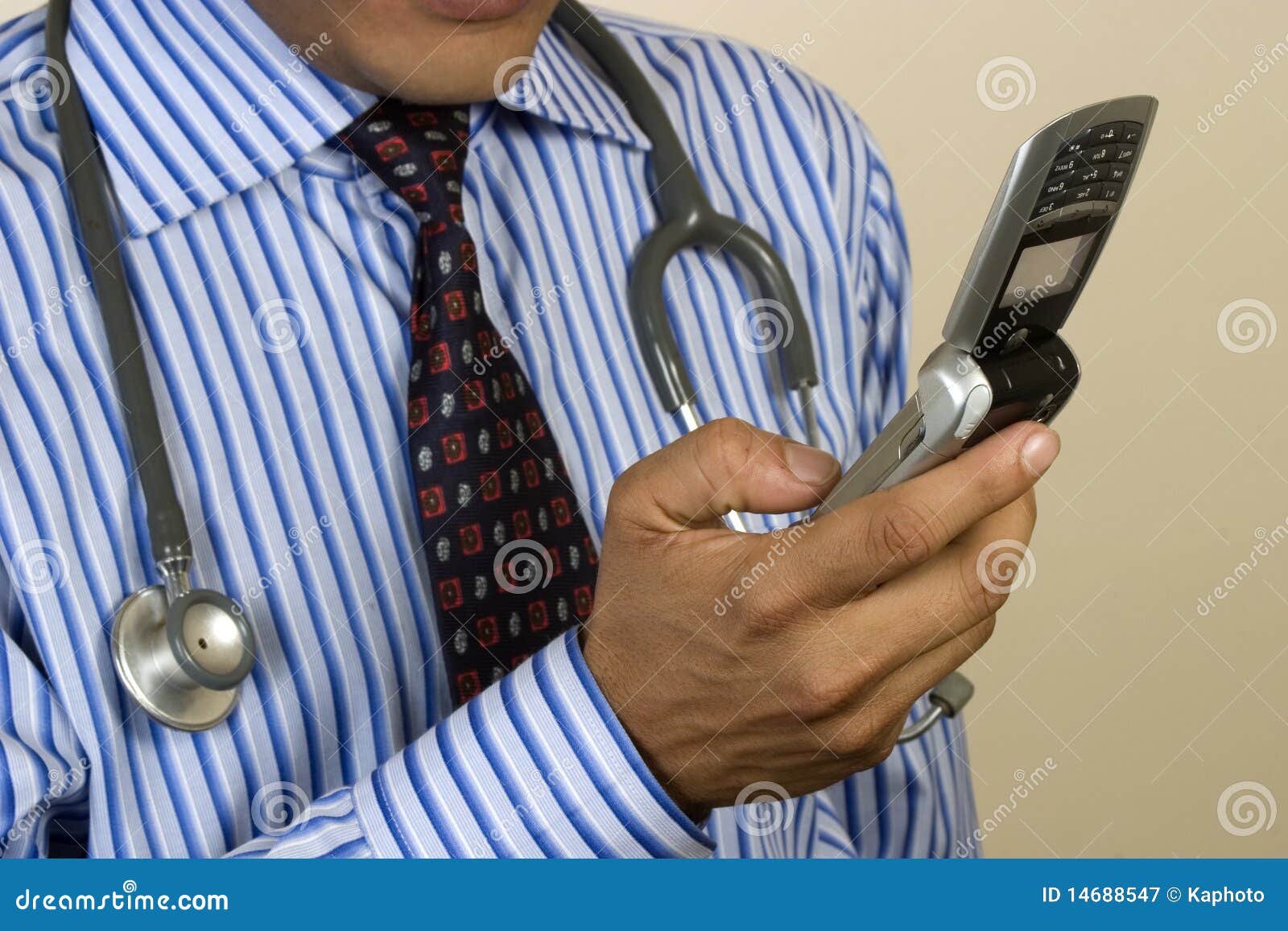 Doctor taking urgent call stock image. Image of help - 14688547