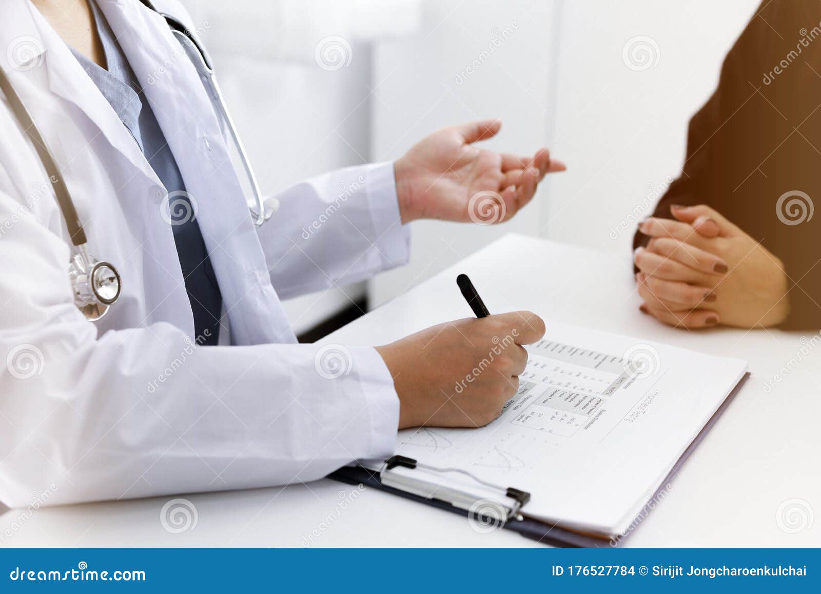 Doctor Talking with Patient in Doctors Office Stock Photo - Image of ... Doctor Talking with Patient in Doctors Office Stock Photo - Image of ...