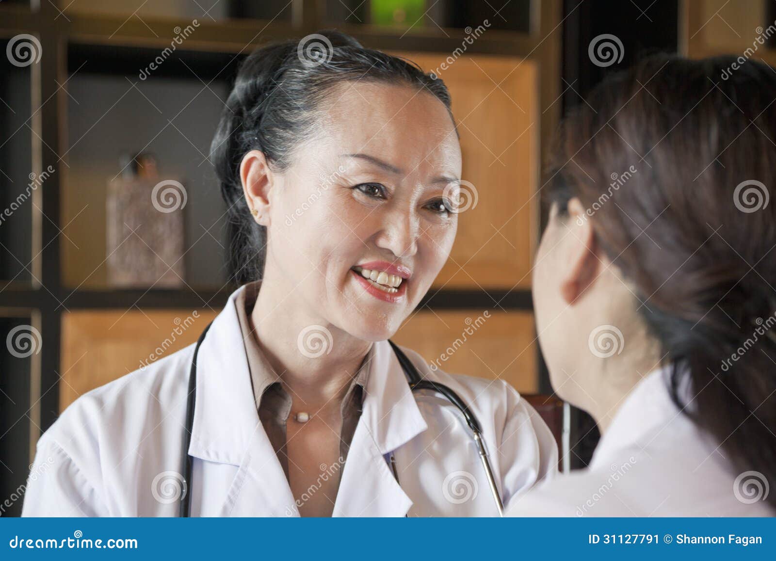 Doctor Talking with Patient, Over the Shoulder View Stock Image - Image ...