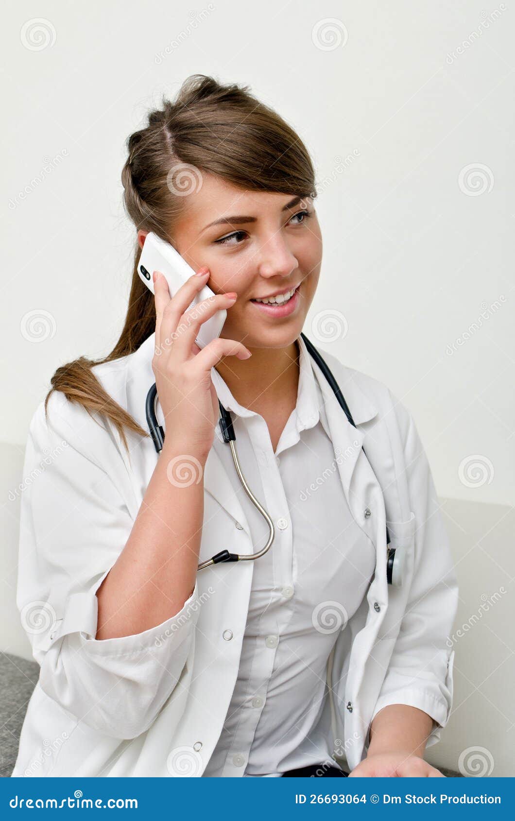 Doctor talking on phone stock photo. Image of healthcare - 26693064