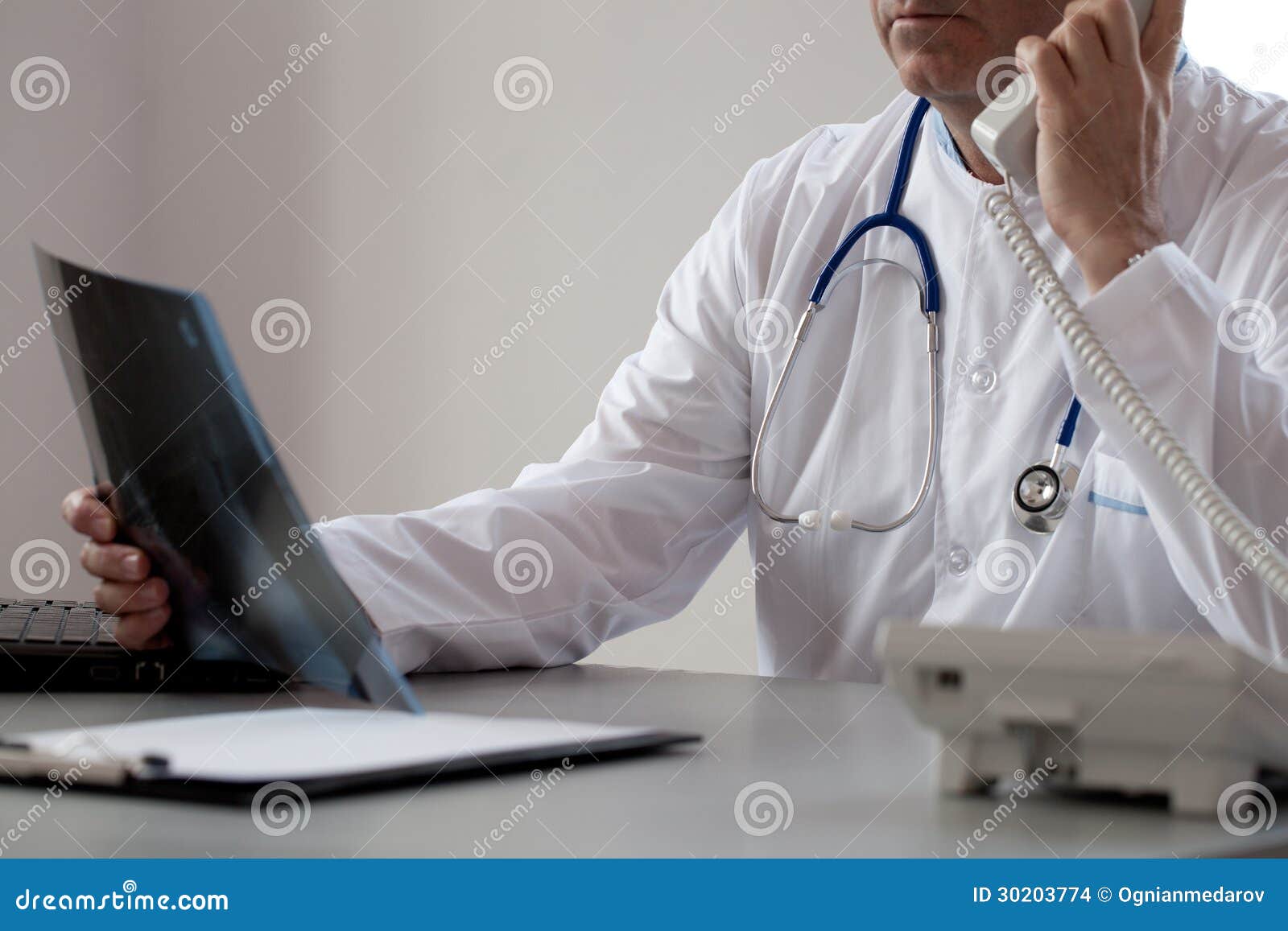 Doctor on the Phone stock photo. Image of xray, phone - 30203774