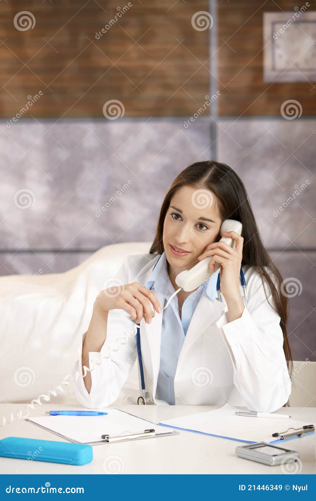 Doctor Talking on Phone in Office Stock Image - Image of clinic ...