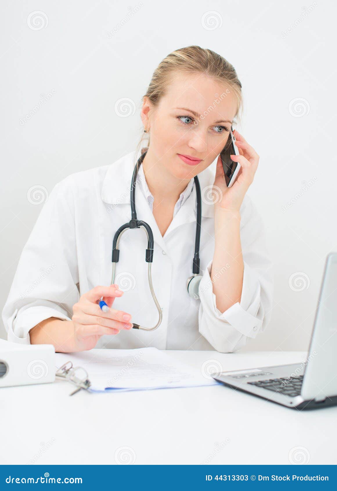 Doctor Talking on the Phone. Stock Image - Image of nurse, desk: 44313303