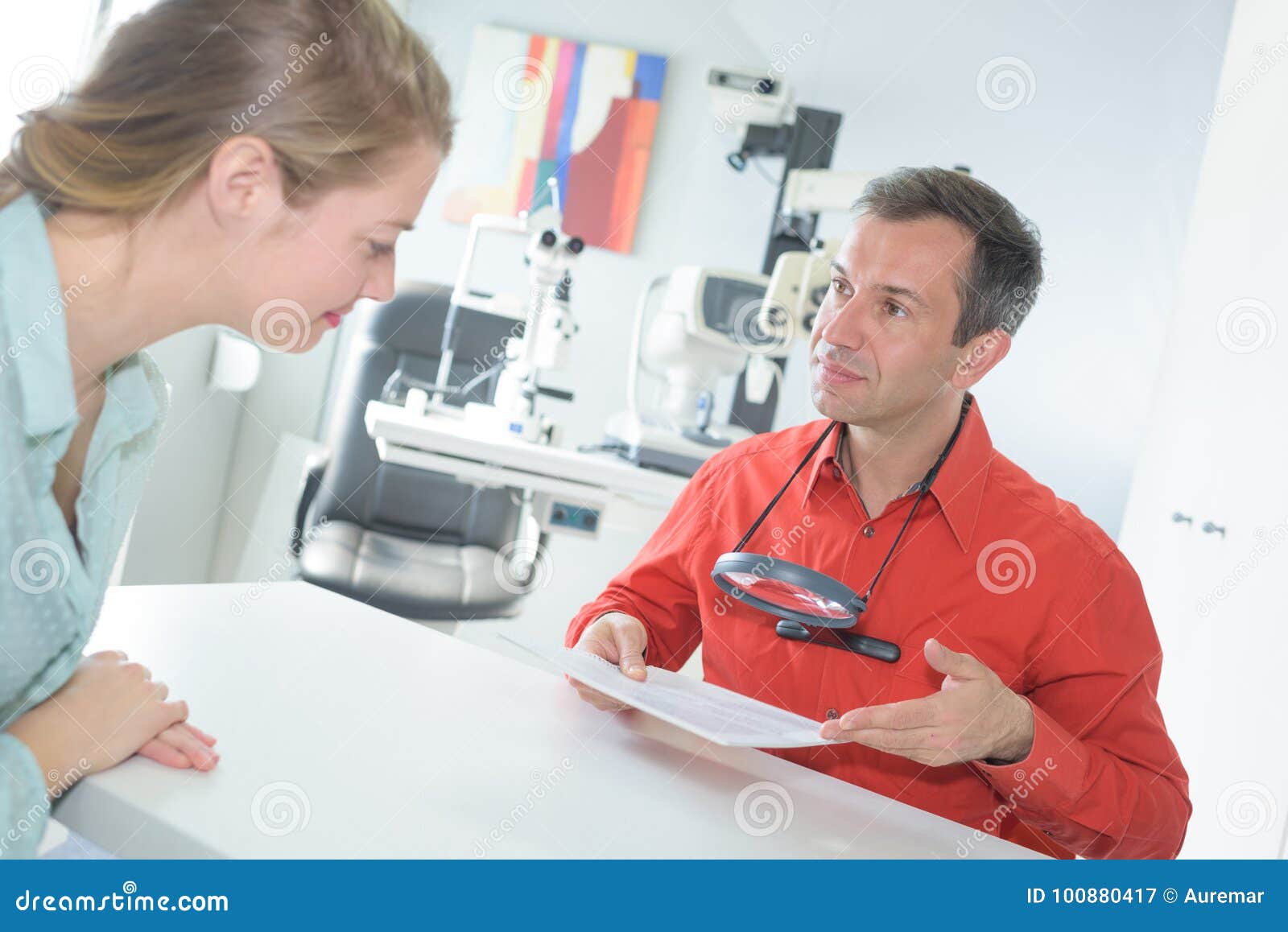Doctor Talking To Female Client in Office Stock Image - Image of ...