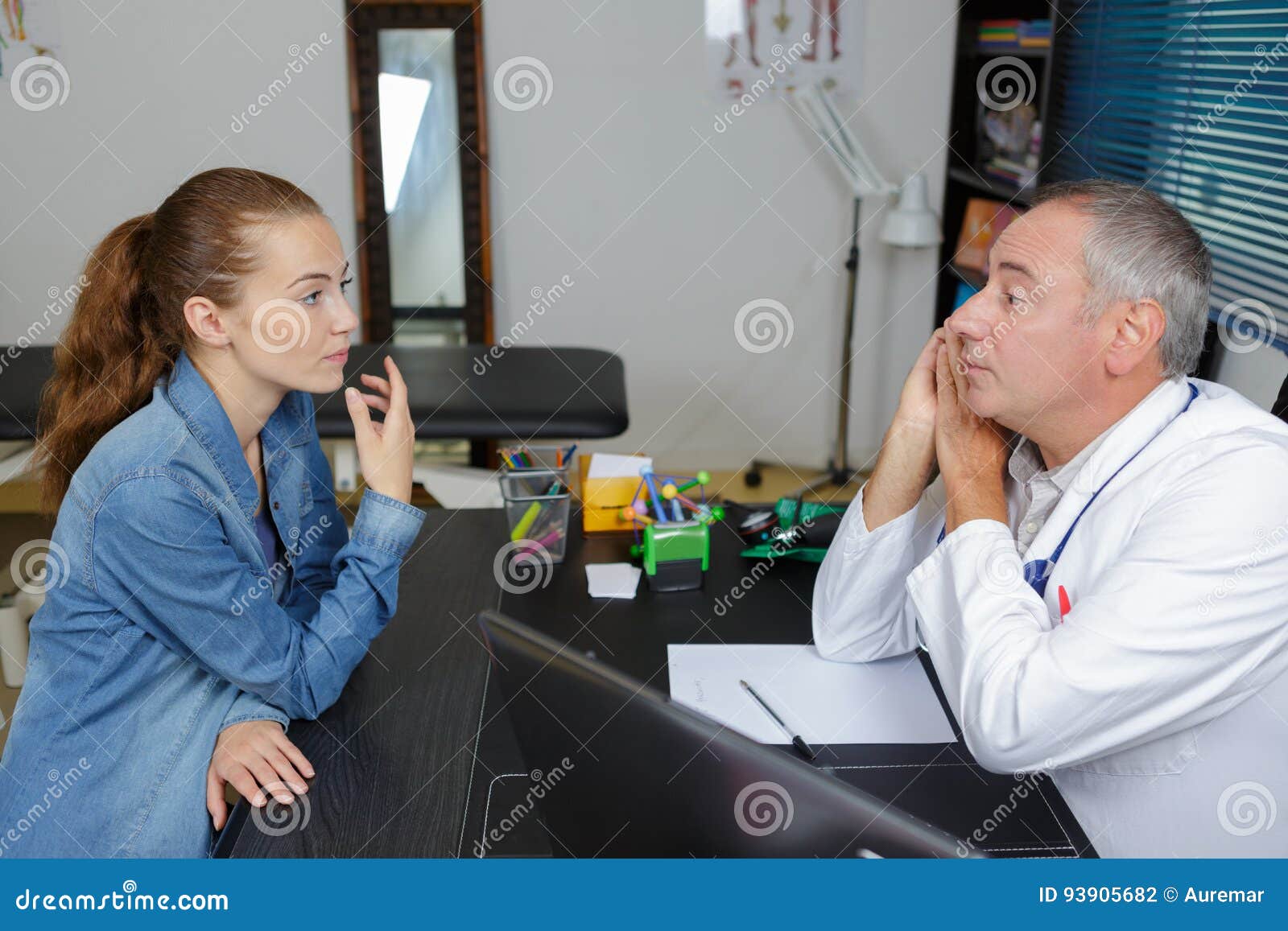 Doctor talking to patient stock photo. Image of emergency - 93905682