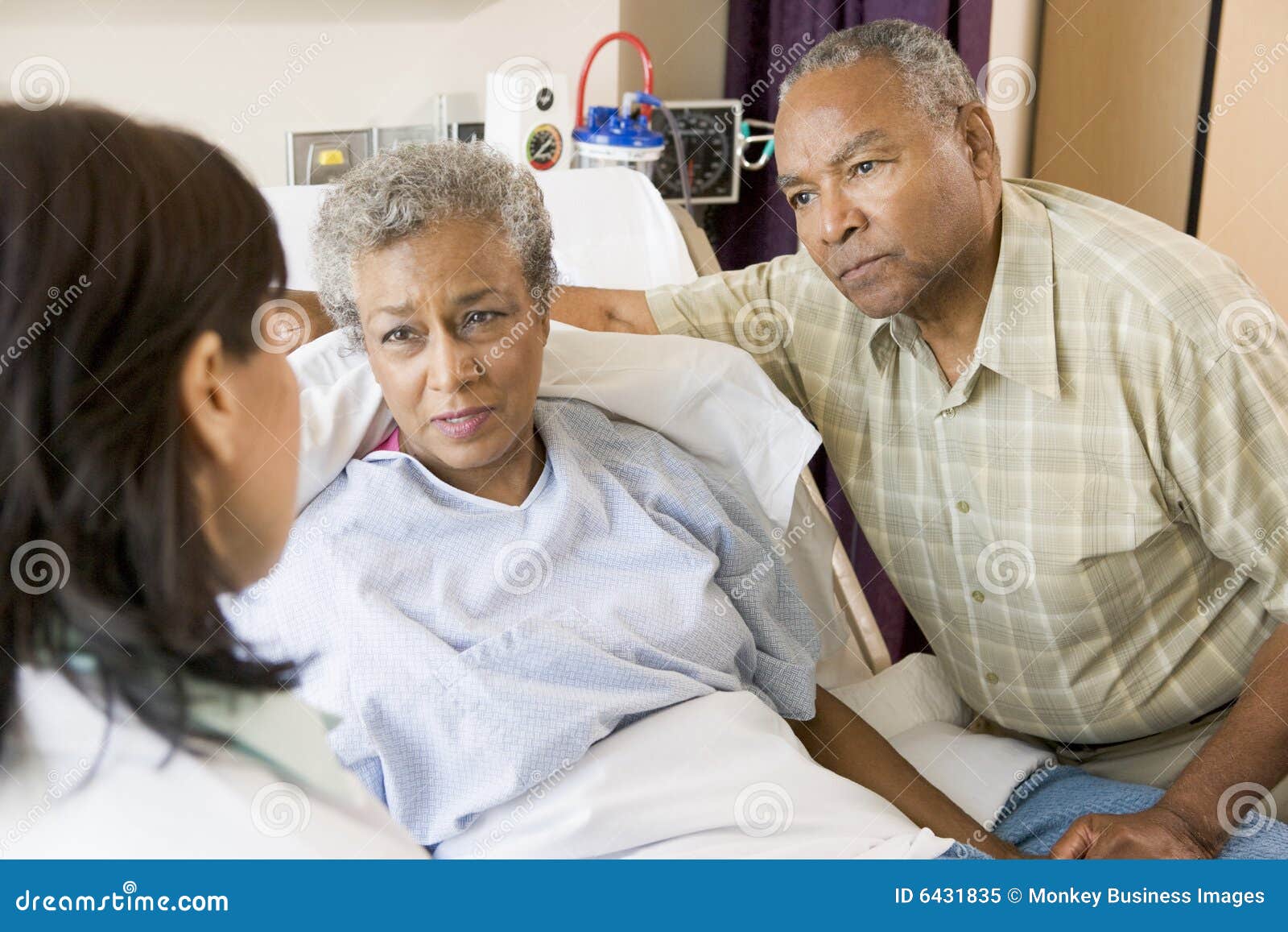 Doctor Talking To Senior Couple Stock Image - Image of problems, color ...