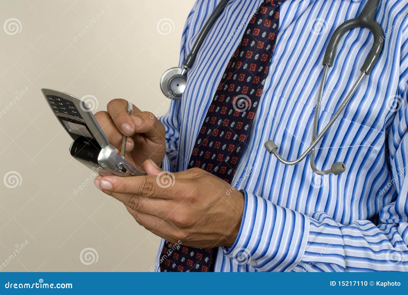 Doctor talking urgent call stock photo. Image of young - 15217110