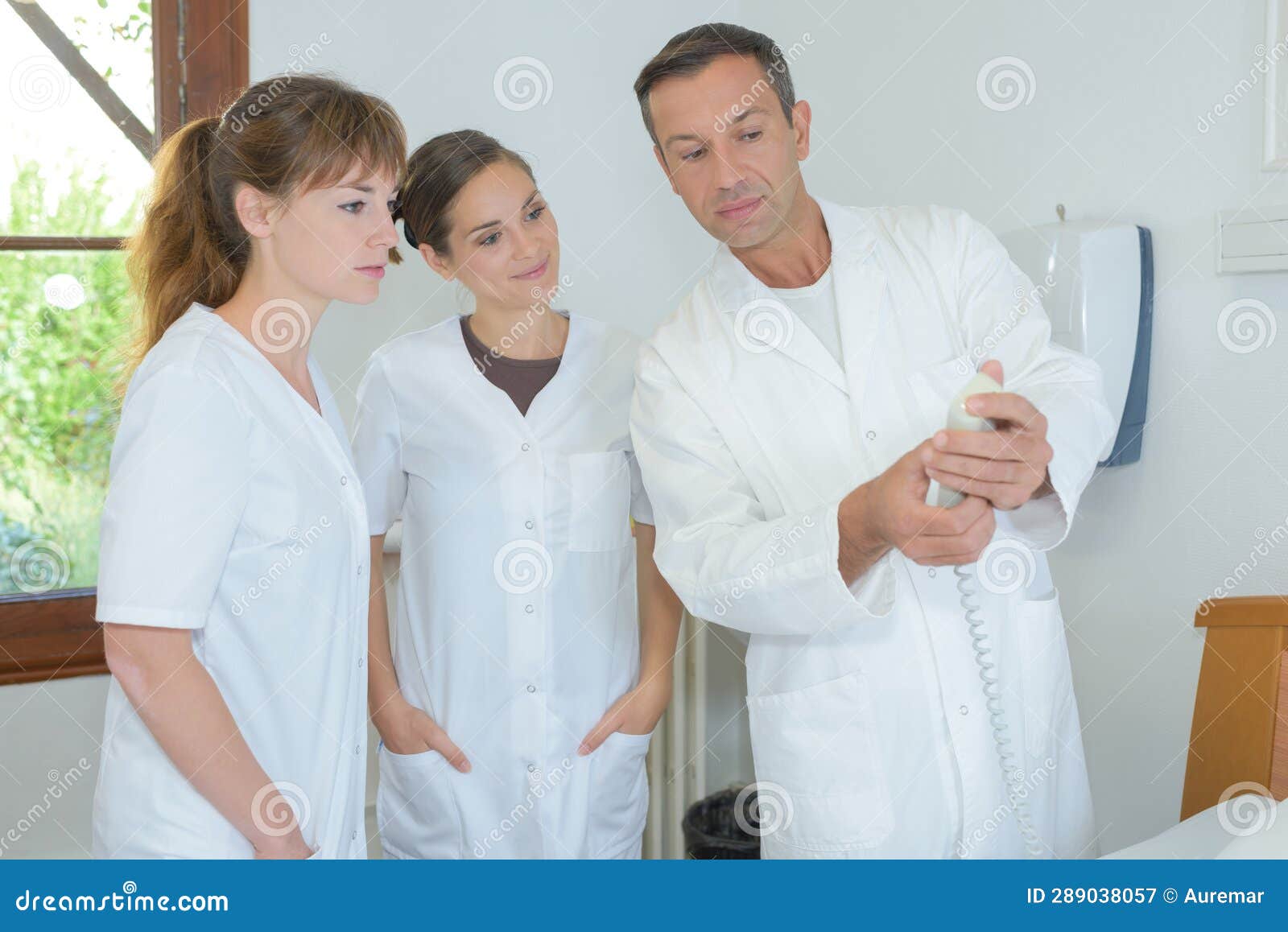 Doctor Teaching Student Nurses Stock Image - Image of electric ...
