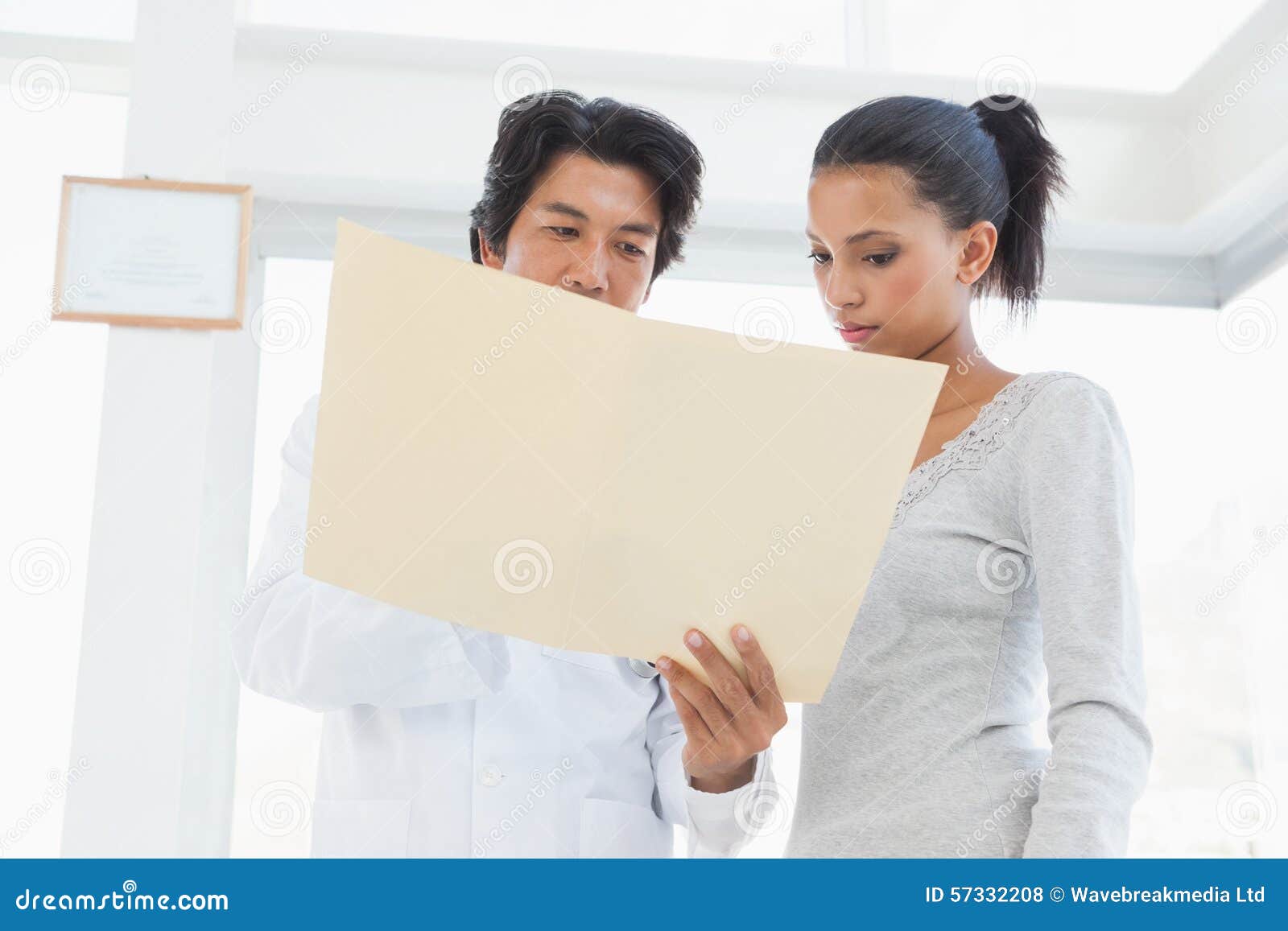 Doctor Telling Patient Her Results Stock Photo - Image of file, female ...