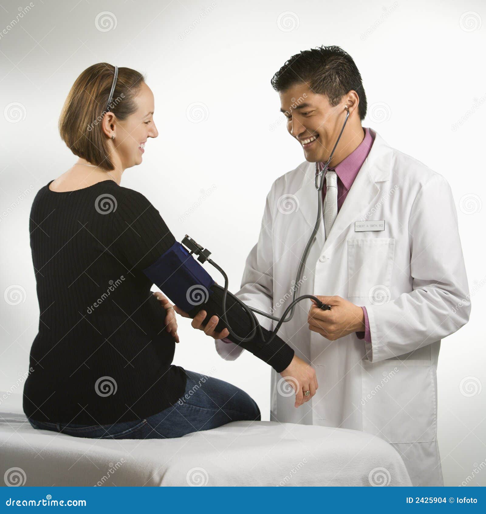 Doctor Testing Blood Pressure. Stock Photo - Image of 070213c0253 ...
