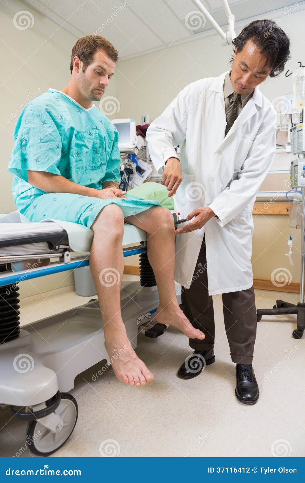 Doctor Testing Reflexes stock photo. Image of patient - 37116412