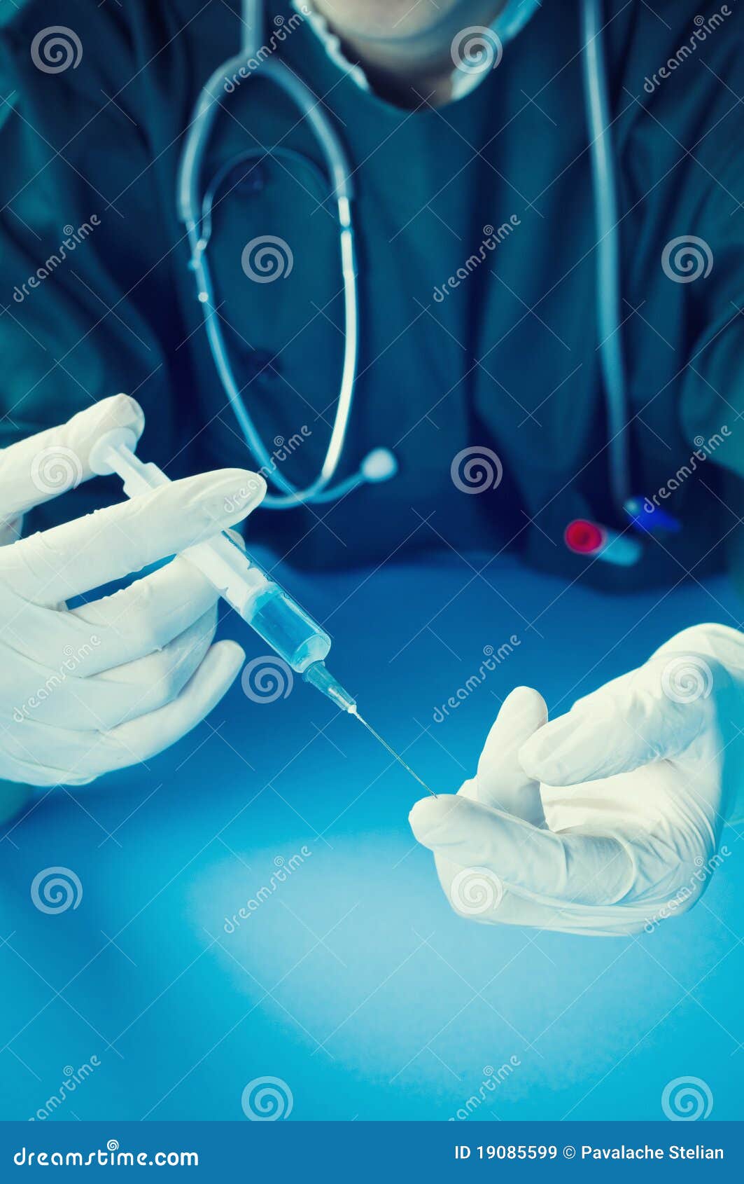 Syringe With A Needle On A Blue Background. Acute Medical Needle. Nurse ...