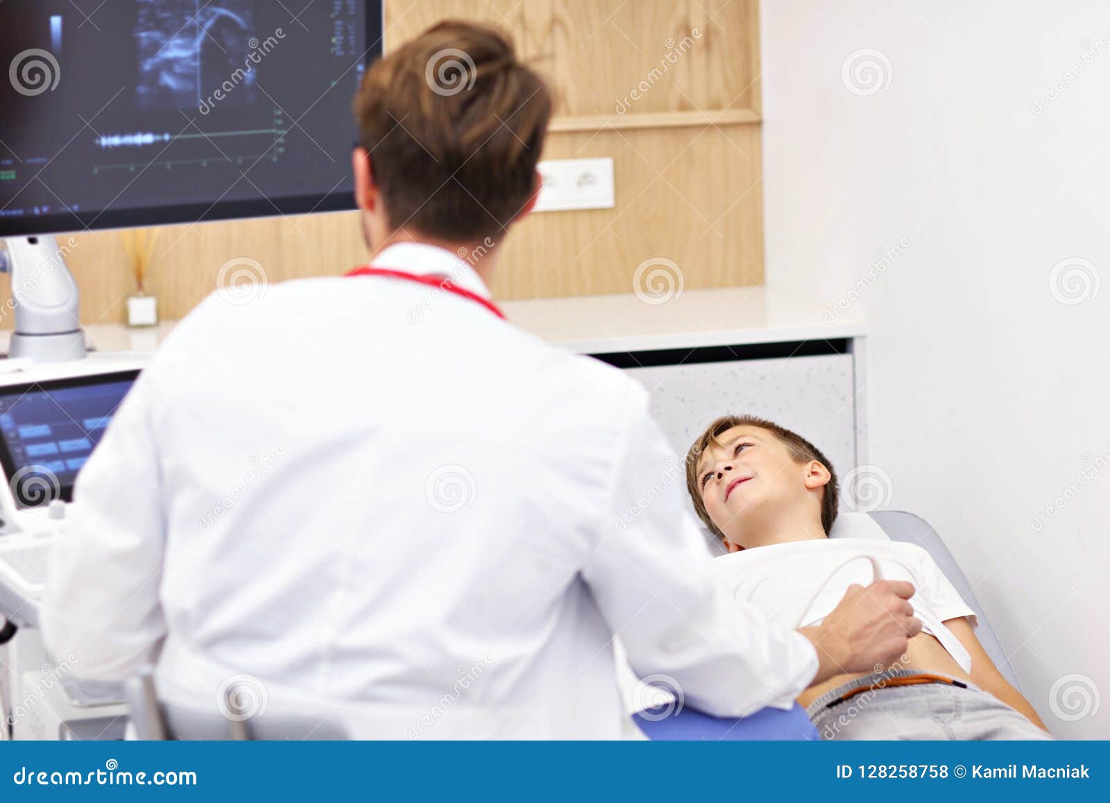 Doctor Testing Young Boy with Usg Stock Photo - Image of hand, people ...