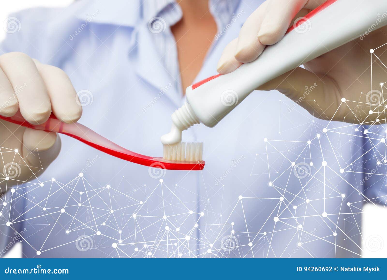 Doctor on the Toothbrush Squeezing the Toothpaste. Stock Photo - Image ...