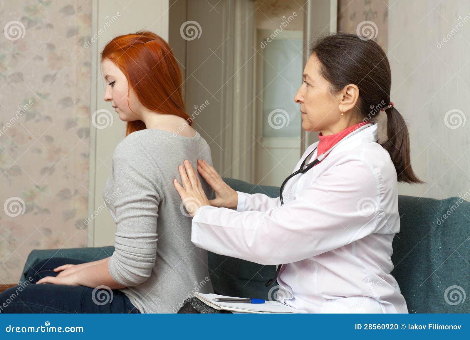Doctor Touching Behind of Teenager Stock Photo - Image of hospital ...