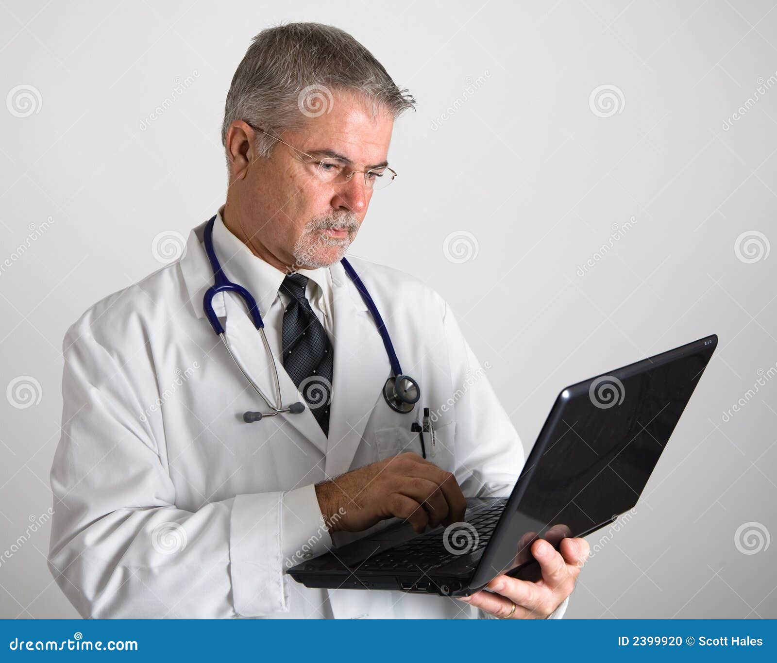 Doctor typing on computer stock photo. Image of medical - 2399920