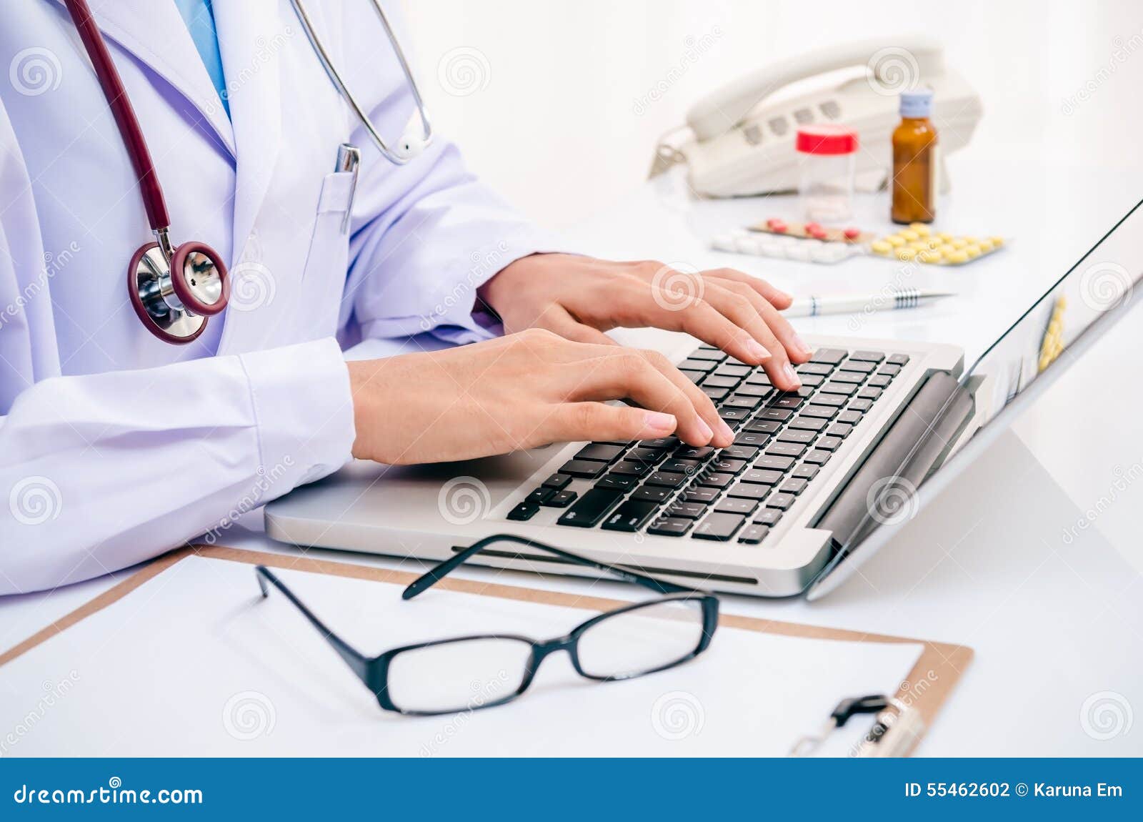 Doctor typing on computer stock photo. Image of hands - 55462602