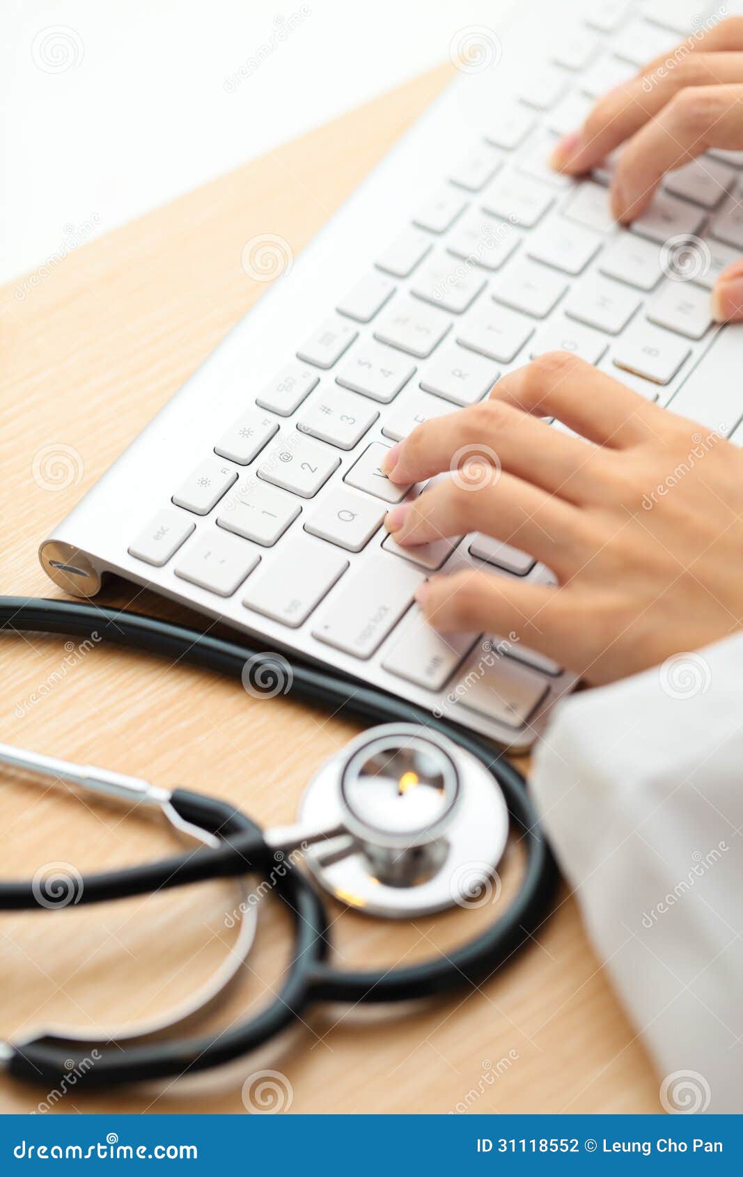 Doctor typing on keyboard stock photo. Image of professional - 31118552
