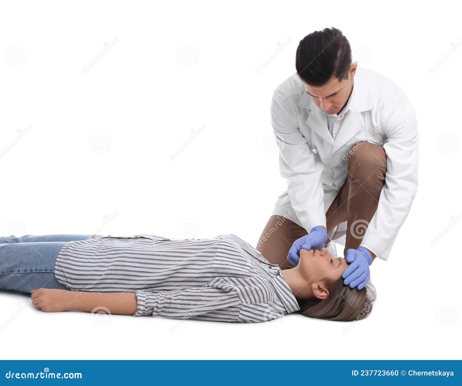 Doctor in Uniform Practicing First Aid on Woman Against White ...