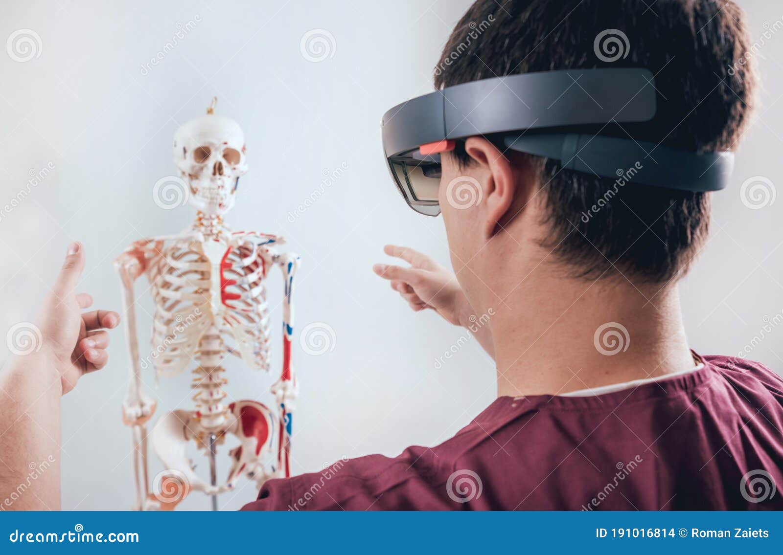 Doctor Uses Augmented Reality Goggles To Exam Human Skeleton. Stock ...