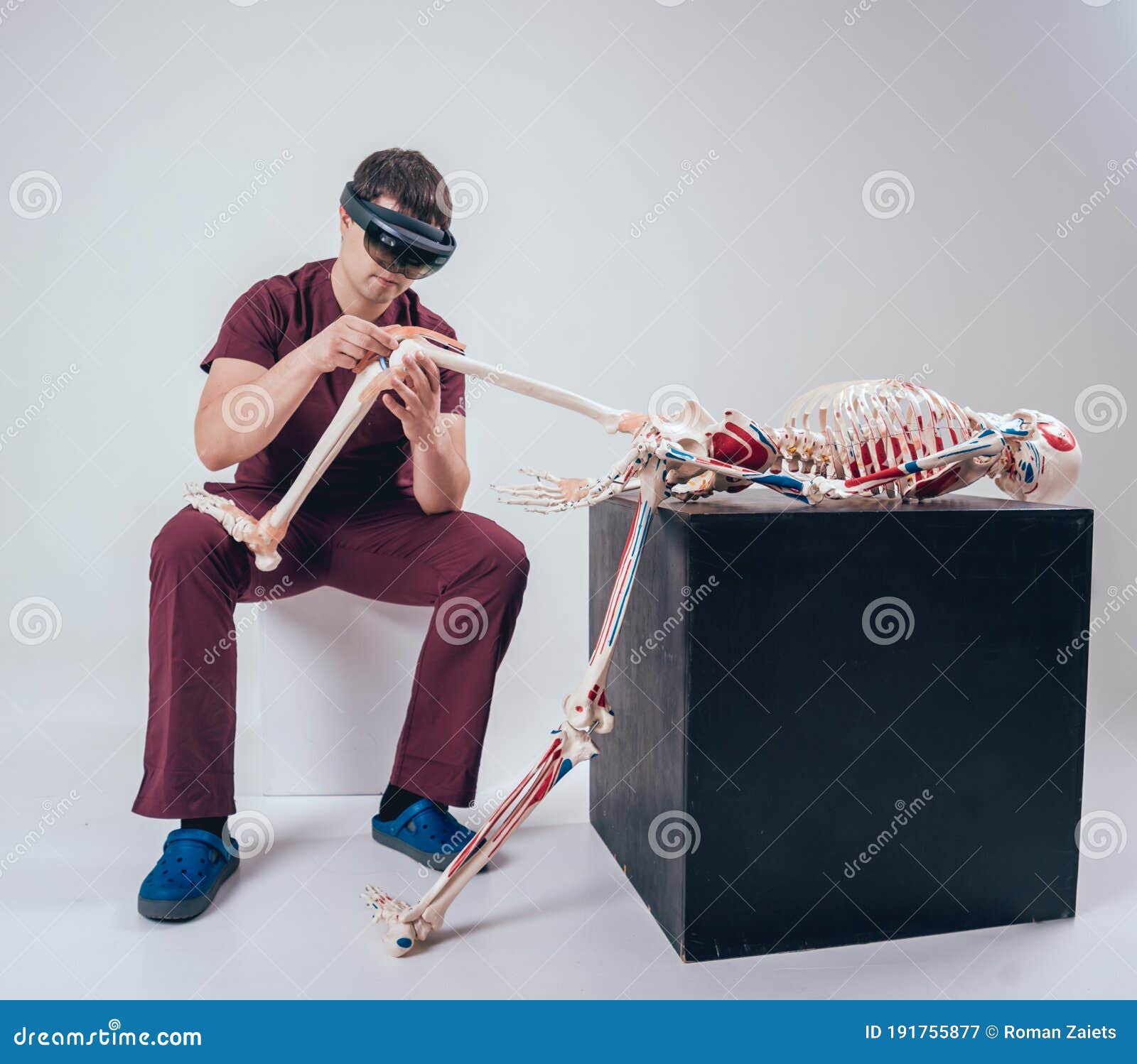 Doctor Uses Augmented Reality Goggles To Exam Human Skeleton. Stock ...