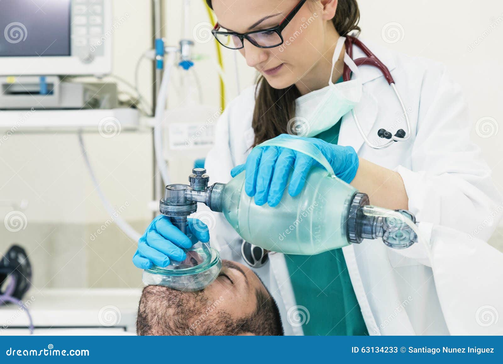 Doctor Using the Ball Resuscitation with a Patient Stock Image - Image ...