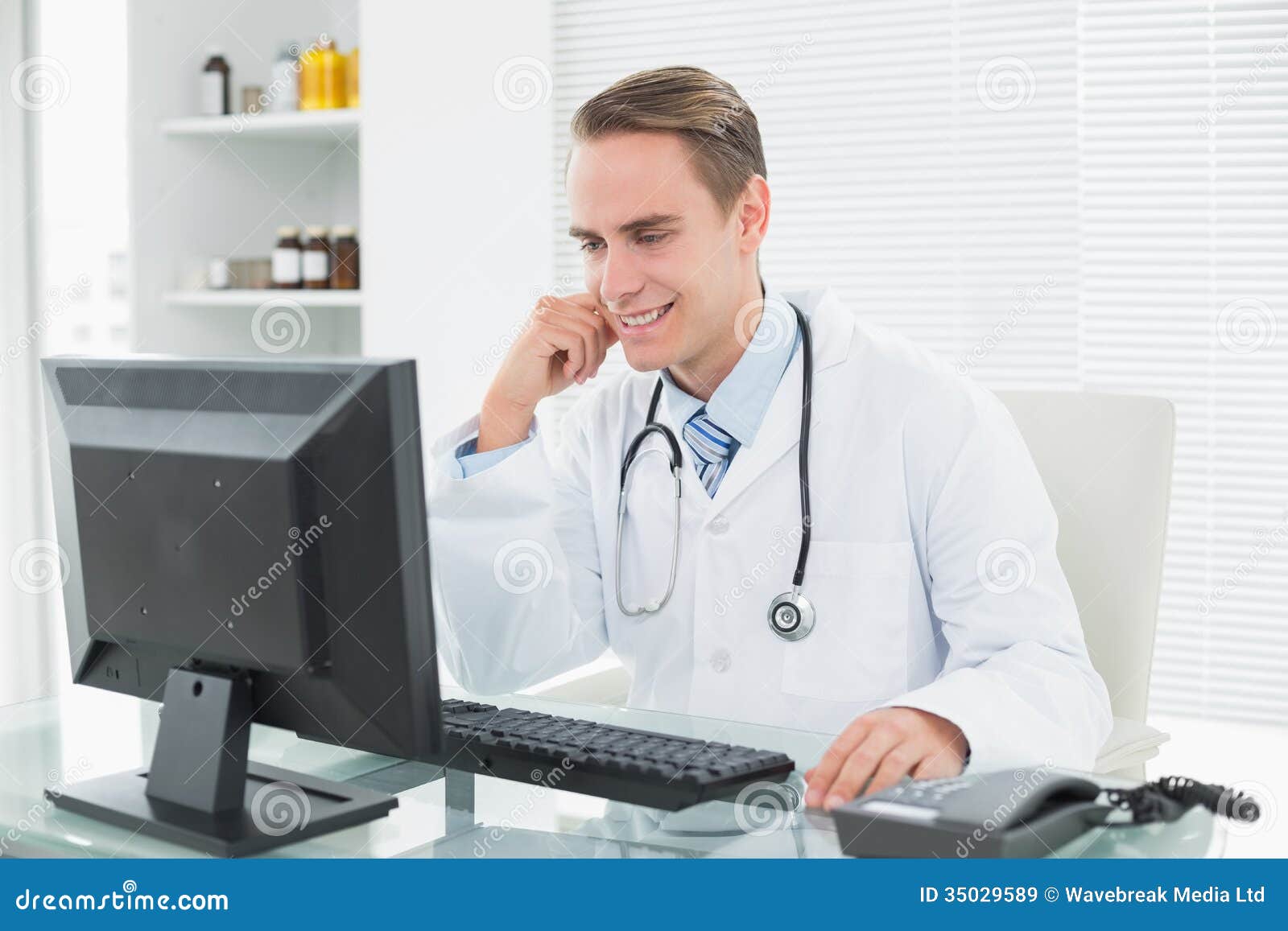 Doctor Using Computer at Medical Office Stock Image - Image of copy ...