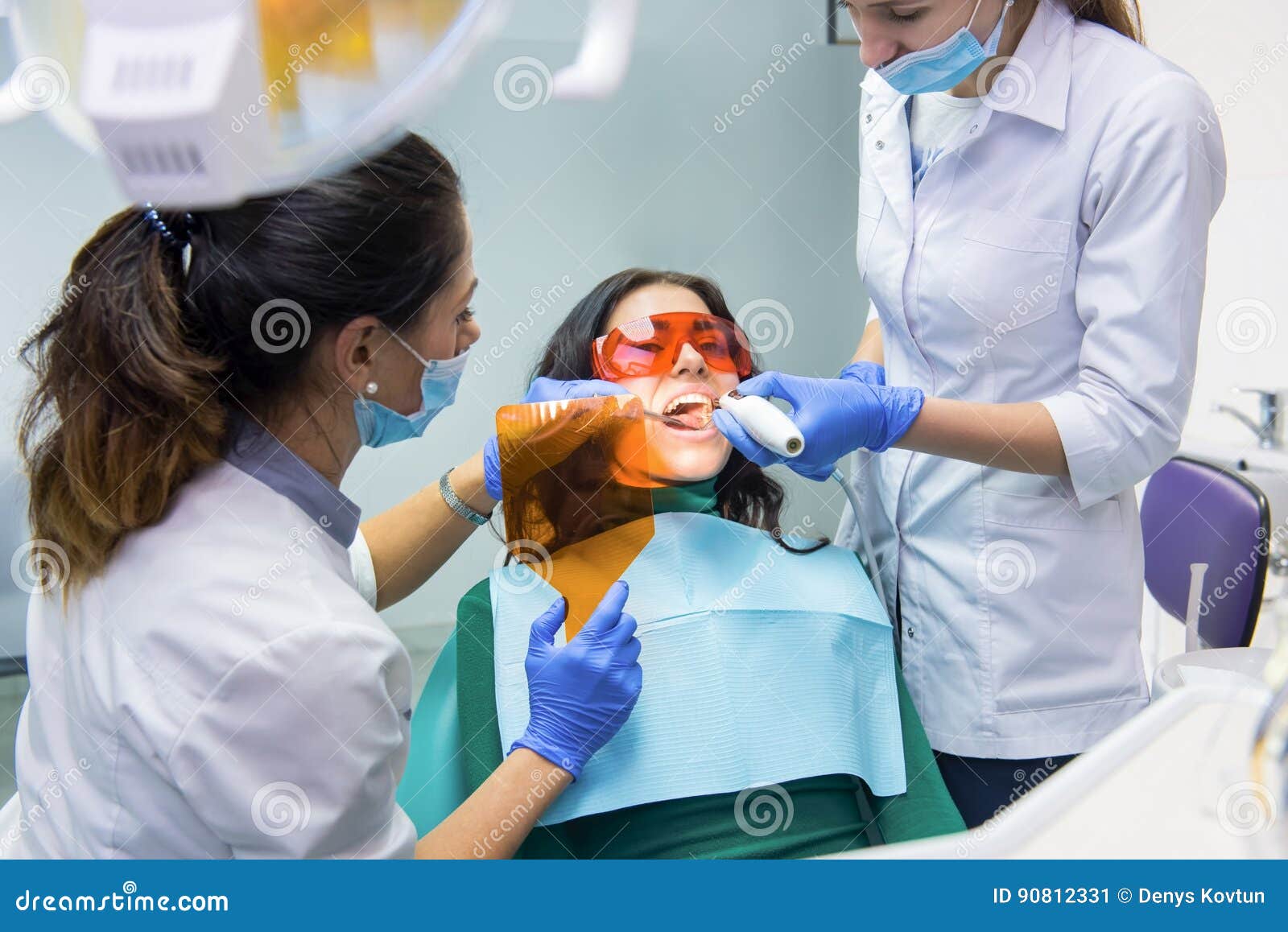 Doctor Using Dental Curing Light. Stock Image - Image of care ...