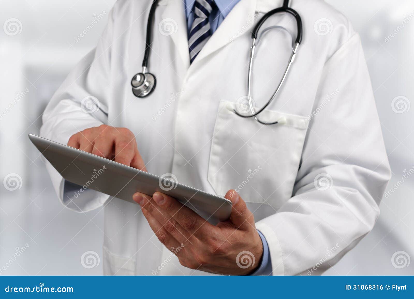 Doctor Using Digital Tablet Stock Photo - Image of corridor, clinic ...