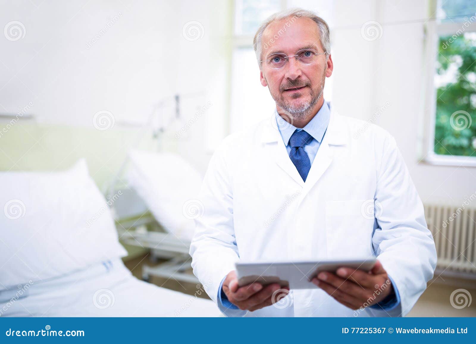 Doctor Using Digital Tablet in Hospital Stock Image - Image of computer ...