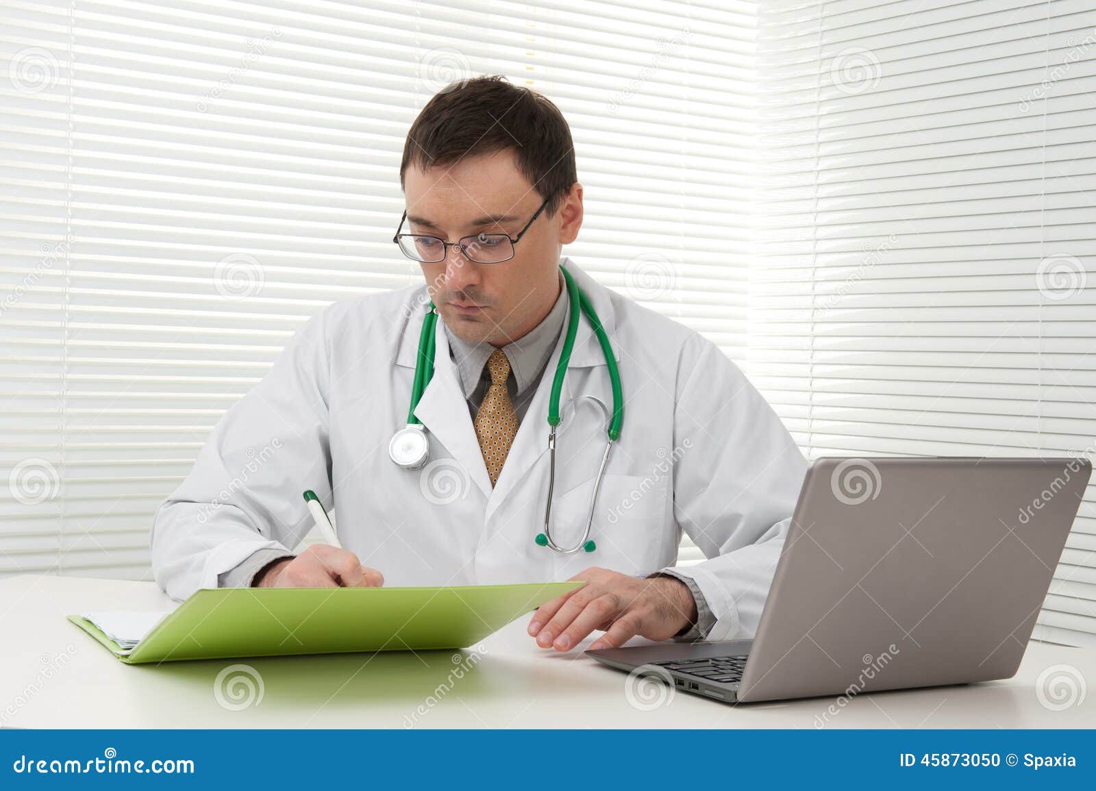 Doctor Using His Laptop Computer Stock Photo - Image of research ...