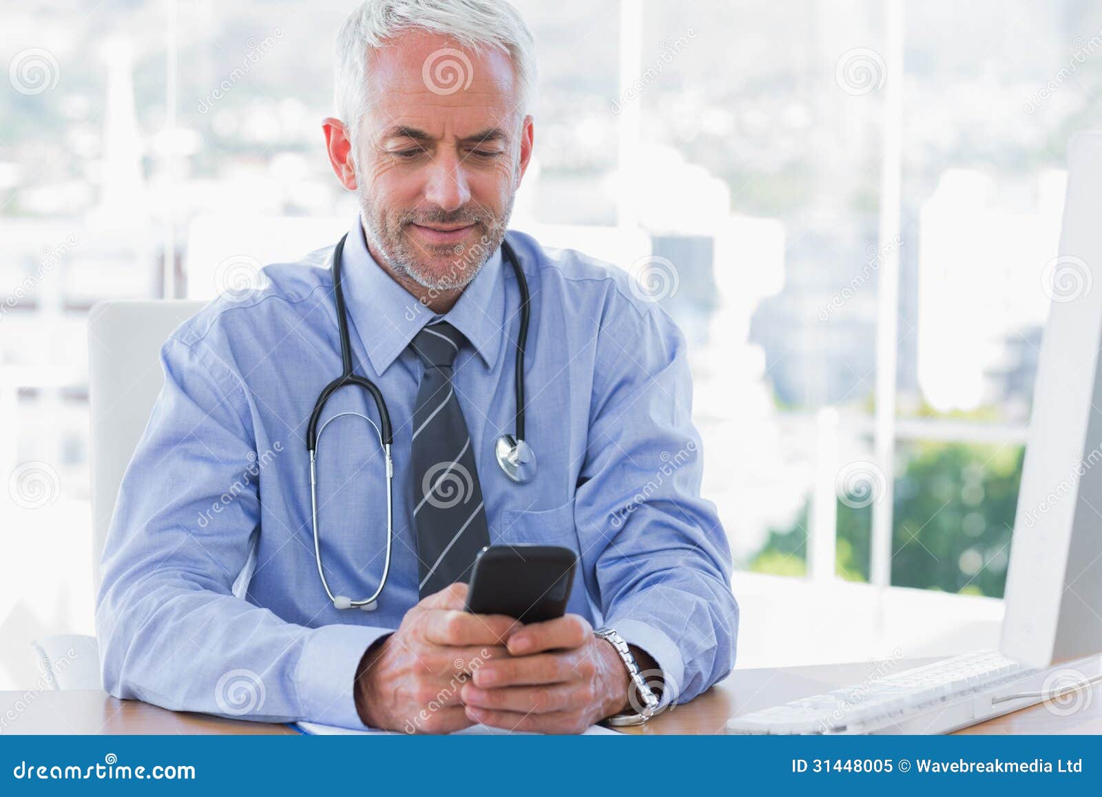 Doctor Using His Smartphone Stock Image - Image of specialist ...
