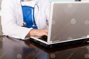 Doctor using laptop stock photo. Image of medicine, doctor - 8107202