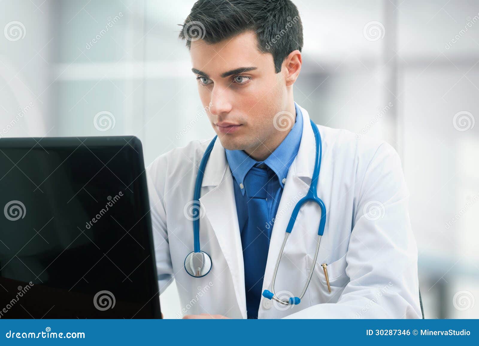 Doctor using a laptop stock photo. Image of medicine - 30287346