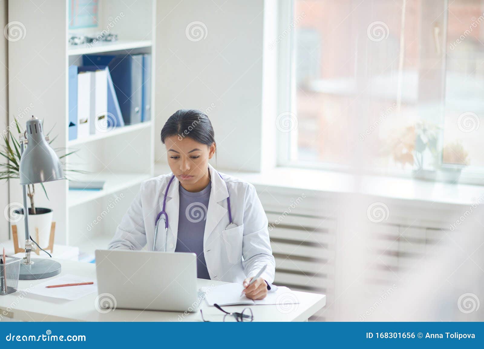 Doctor Using Laptop at Office Stock Photo - Image of clinic, technology ...