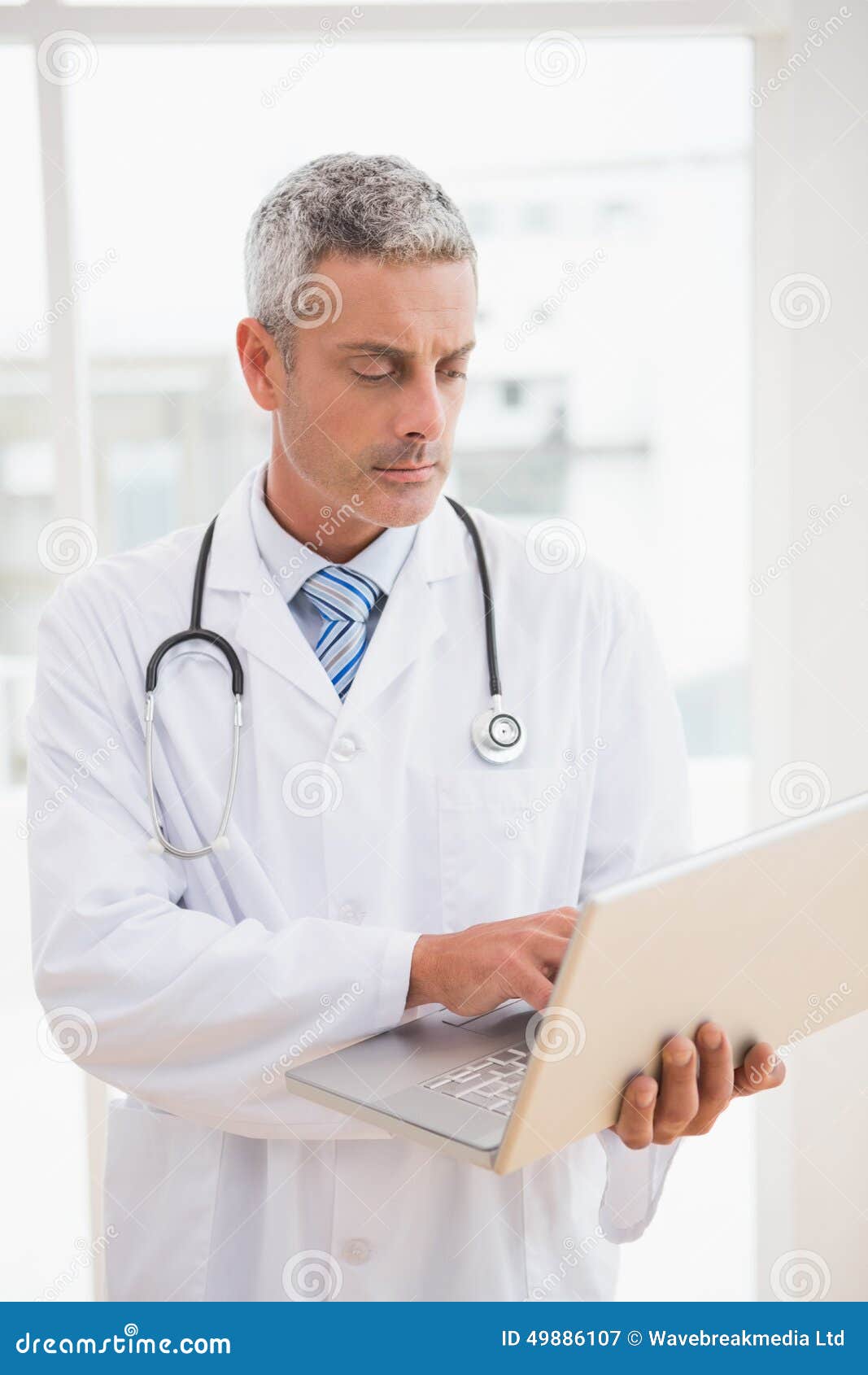 Doctor Using Laptop Smiling To Camera Stock Image - Image of healthcare ...