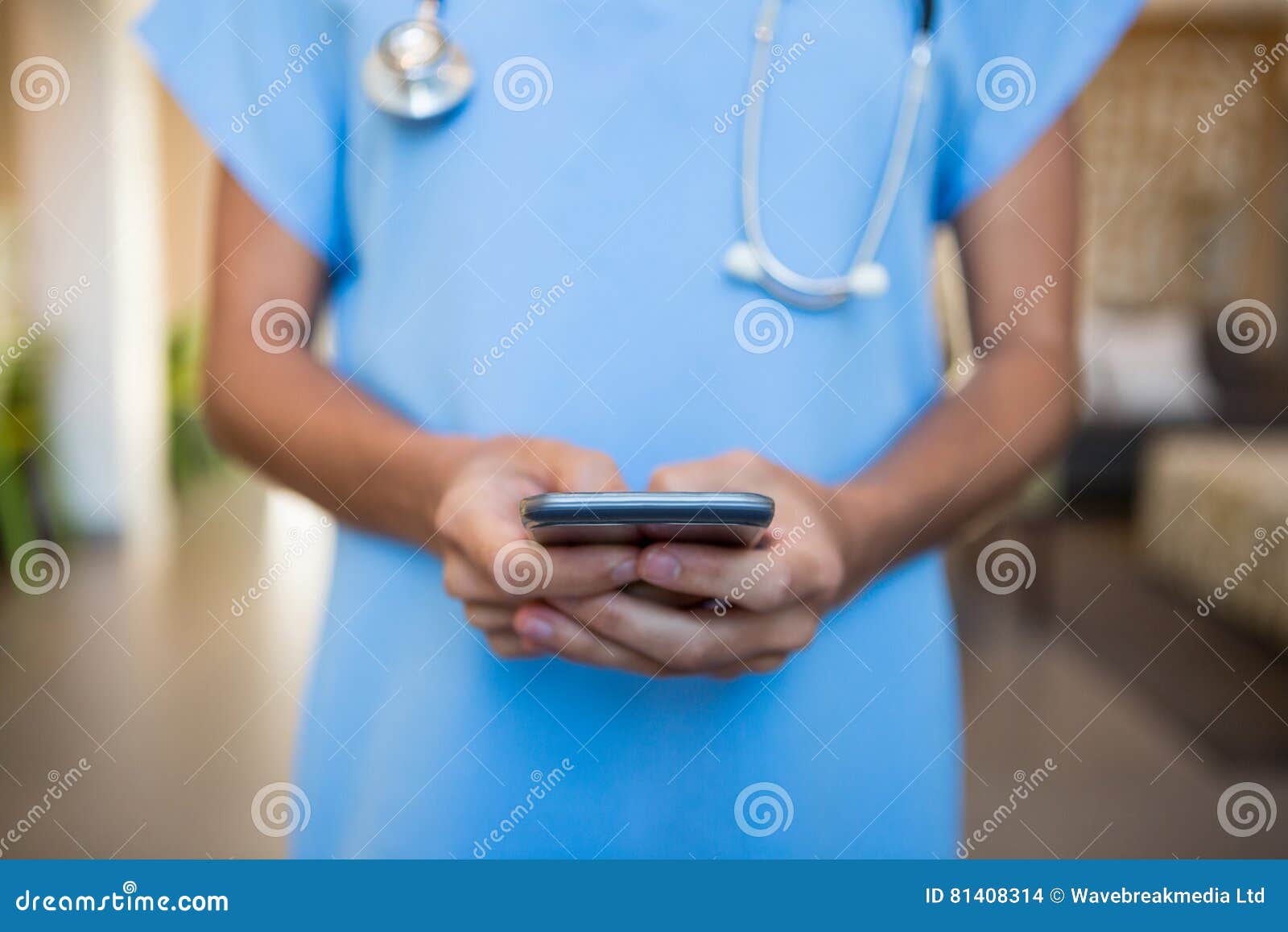 Doctor Using Mobile Phone in Hospital Stock Photo - Image of ...