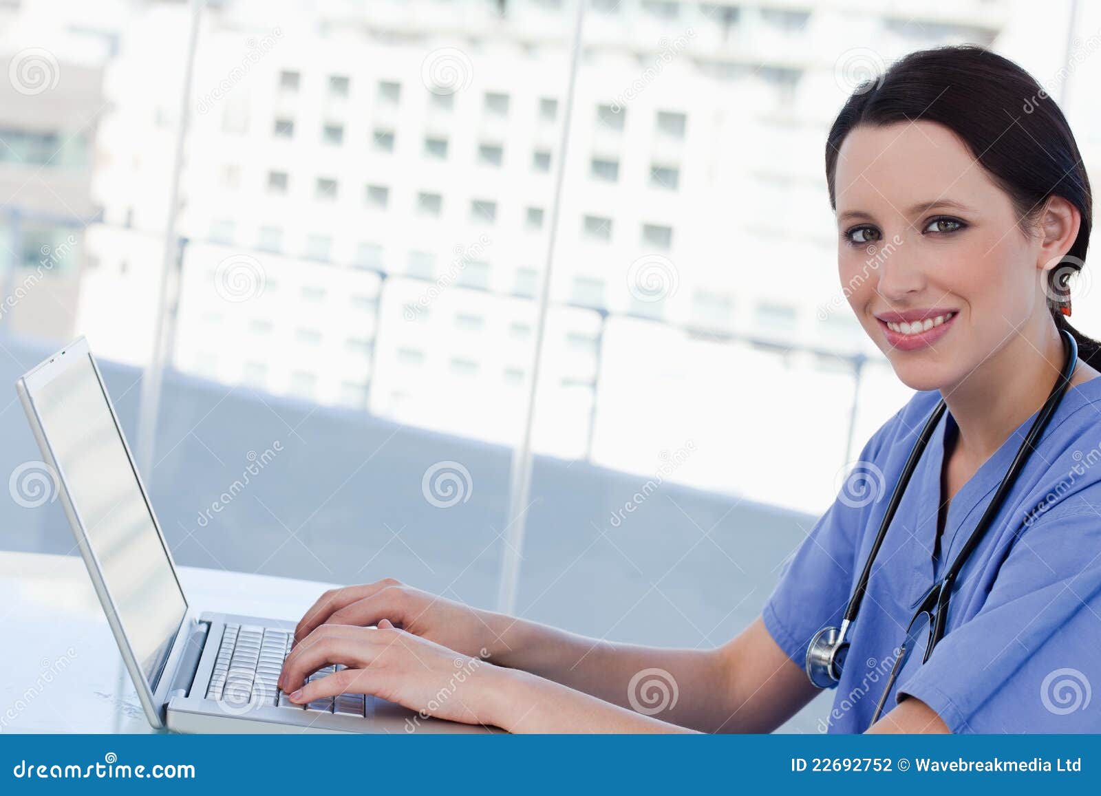 Doctor using a notebook stock photo. Image of notebook - 22692752