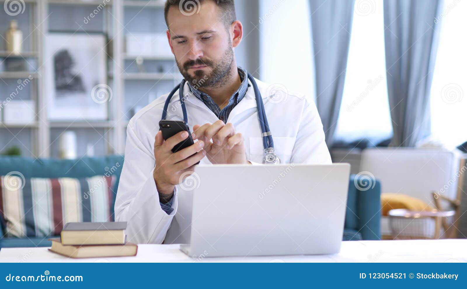 Doctor Using Smartphone for Internet Stock Image - Image of medical ...