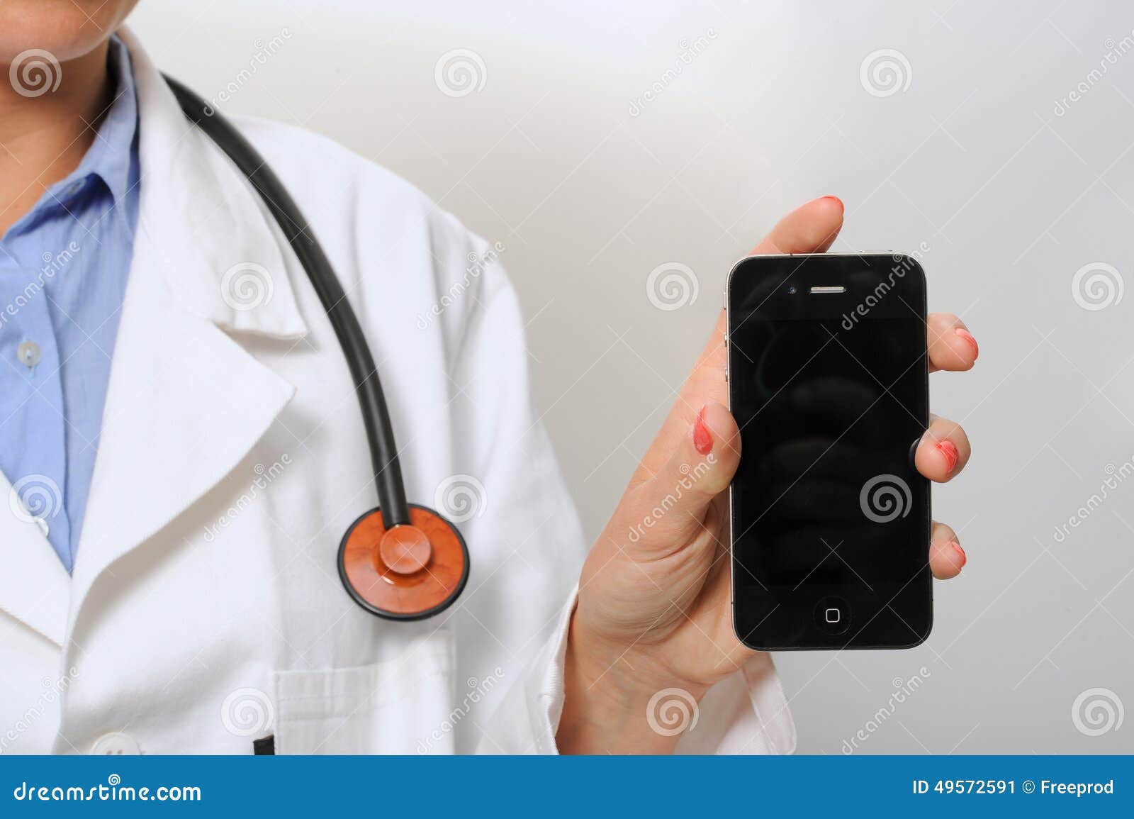 Doctor using smartphone stock image. Image of display - 49572591
